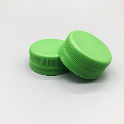 China Beverage Ribbed Plastic Water Bottle Caps Non Refillable With Liner for sale