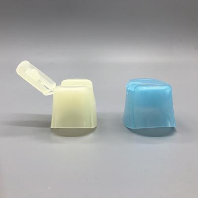 China Cruved Oval Flip Top Plastic Hair Shampoo Bottle Cap 20mm Snap Neck for sale