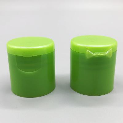 China 24/415 Green Color Polish Cosmetic Plastic Bottle Screw Flip Top Cap Cover for sale