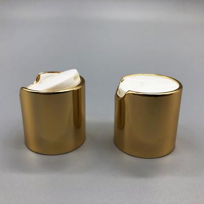 China Small Plastic Disc Cap One Handed Dipensing Aluminum Gold Metalized for sale