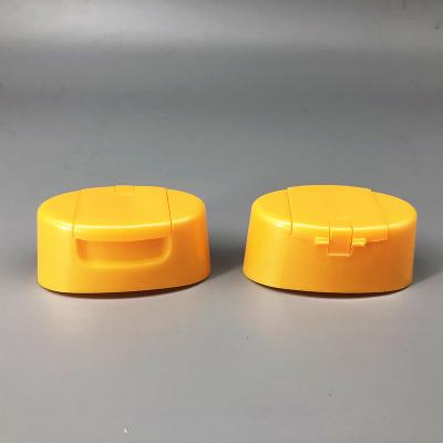 China Curved Shape Flip Top Dispensing Caps 24mm Snap Size ISO9001 Approved for sale