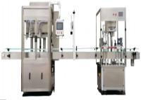 China Rotary Bottle Filling Machine Linear Tracking Filling Capping Machine 40 Bottles Per Minute Customizable Heads for sale