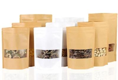China Custom Stand Up Kraft Paper Ziplock Bags with Clear Window 20-200 Micron for sale