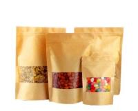 China Food Grade Resealable Zipper Pouch Brown Kraft Paper Bag with Window for Seeds 10000pcs MOQ for sale