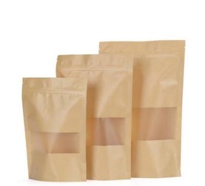 China Custom Printed Kraft Paper Stand Up Pouch with Clear Window for Food Packaging 10000pcs MOQ for sale