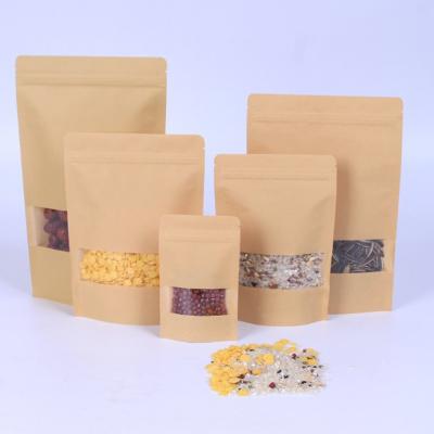 China Food Grade Brown Kraft Paper Stand Up Zipper Poly Bags with Clear Window Custom Size for sale
