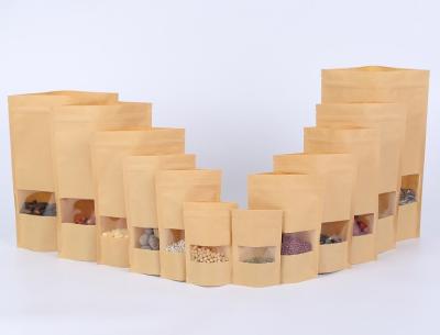 China Custom Kraft Paper Stand Up Pouch with Zipper 10000 Pcs Food Grade Tea Coffee Packaging for sale