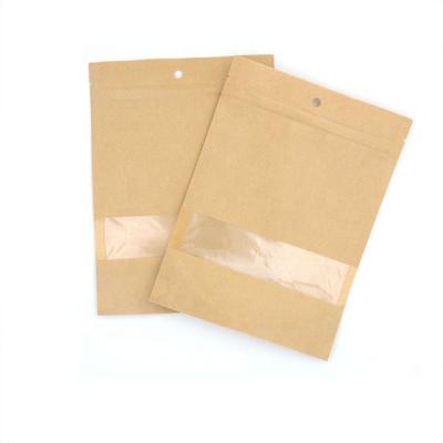 China Custom Kraft Paper Stand Up Pouch 20x30x5cm with Zipper and Window for sale