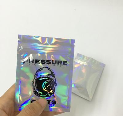 China Custom Holographic Mylar Bag Child Proof Smell Proof Foil Pouch for Cosmetics 20-200 Micron for sale