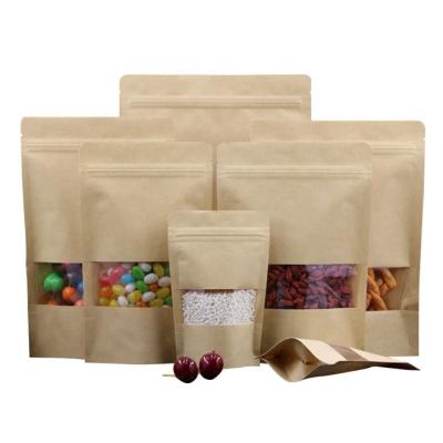 China Kraft Paper Stand Up Pouches with Zipper and Window Custom Size Food Packaging Bags 20-200 Micron for sale