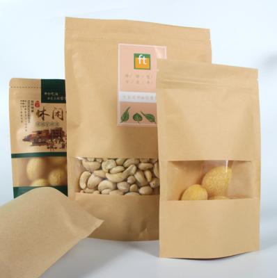 China Custom Stand Up Kraft Paper Bag with Clear Window for Cookies and Nuts 10000 Pcs MOQ for sale