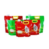 China Custom Gravure Printed Stand Up Spout Pouch for Beverage Liquid Milk Juice Plastic Packing Bag 10000pcs MOQ for sale