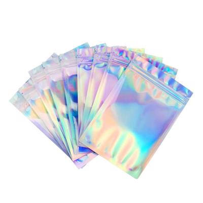 China Custom Holographic Foil Zipper Pouch 100x150mm Food Grade Aluminum Mylar Bag for sale