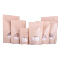 China Custom Stand Up Kraft Paper Zipper Bag with Transparent Window 20-200 Micron for sale