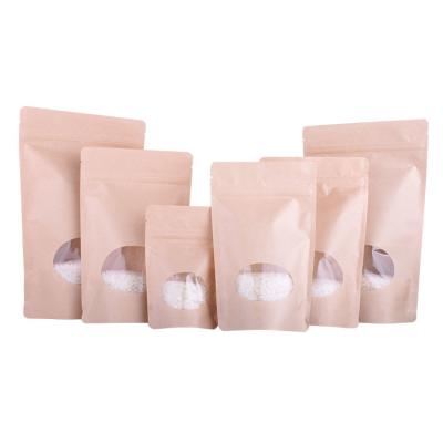 China Custom Stand Up Kraft Paper Zipper Bag with Transparent Window 20-200 Micron for sale