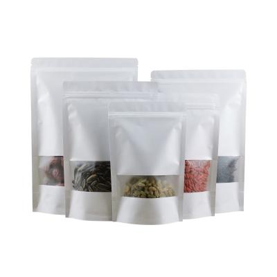 China Custom Logo Flat Bottom Pouch with Window Zipper 10000 Pieces Kraft Paper Food Snack Packaging for sale