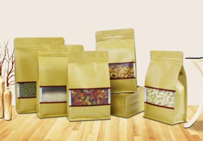 China Stand Up Zip Pouch Brown Kraft Paper Bags Dried Food Packaging with Window Custom Size for sale