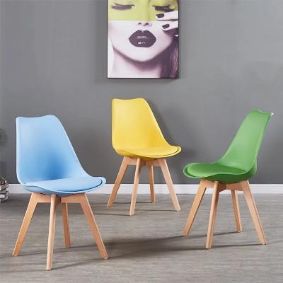 China Heavy Duty Dining Chair Modern Room Plastic Chairs Comfortable Upholstered Cushion Seat with Wood Legs for Kitchen for sale