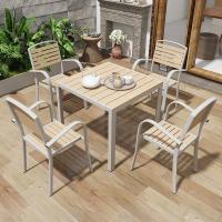 China Modern Design Style Outdoor Courtyard Table and Chair Set Made of Corrosion Resistant Wood-Plastic Material for Garden for sale