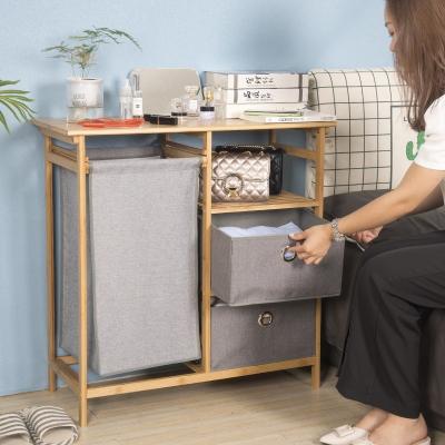 China High Quality BamBoo Wood Laundry Hamper Basket Table With Sliding Bag Storage Rack for sale