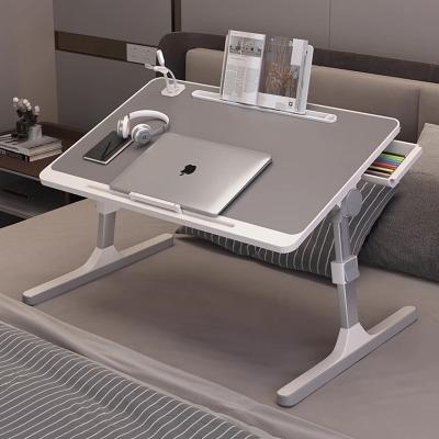 China Notebook computer desk bed reading table PU leather desktop por folding lifting Angle/height adjustment for sale