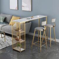 China Iron Metal Type Modern Apartment Dining Table with Storage and Comfortable Velvet Pad Chair High Bar Stools Footrest for sale