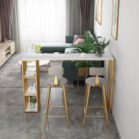 China Iron Metal Type Modern Apartment Dining Table with Storage and Comfortable Velvet Pad Chair High Bar Stools Footrest for sale
