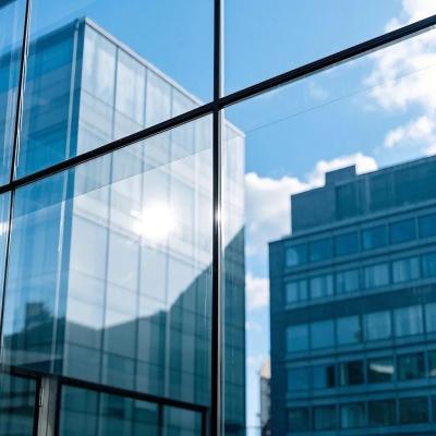 China Modern Low E Coated Float Reflective Glass Curtain Wall Architecture Panel for sale