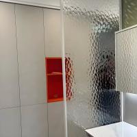 China 3D Three Dimensional Water Ripple Embossed Decorative Glass Bathroom Dry Wet Separation Sliding Door Custom for sale