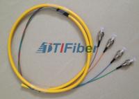 China 4 Core ST UPC Singlemode Fiber Optic Pigtail Yellow PVC Jacket G652D 0.9mm for sale