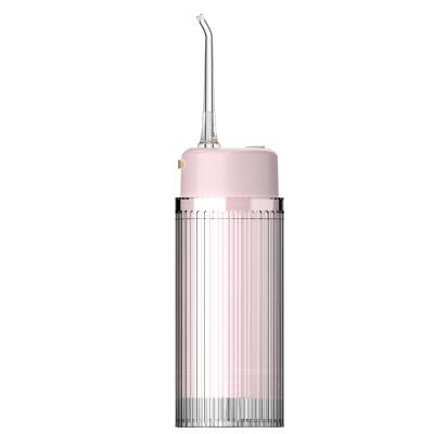 China CQC Mini Oral Care Water Flosser IPX7 Jet Floss Water Flosser With Telescopic Water Tank for sale
