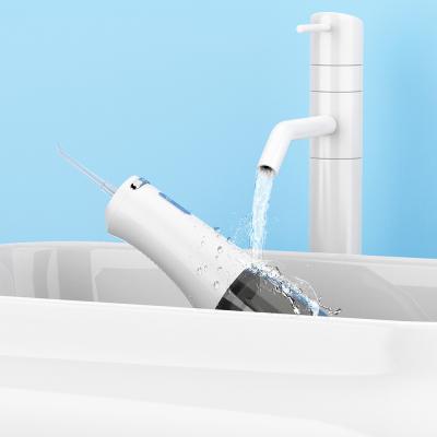 China ABS PC Portable Oral Irrigator With 300ml Water Tank And 4 Pressure Modes for sale