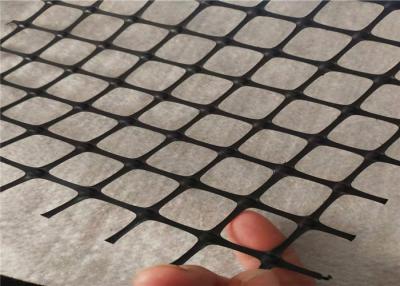 China Coated Bitumen Two Way Biaxial Plastic Geogrid For Retaining Road for sale
