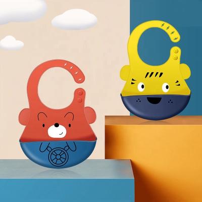 China Michi Star 25cmx19cm Silicone Baby Bibs Animal Shapes With Food Pocket for sale