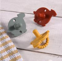 China Food Silicone Baby Pacifier Dinosaur Head Orthodontic Nipple for sale