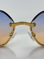 China DSGTA753UCR Elegant Rimless Cut Edge Octagonal Sunglasses Ladies Hollow Logo Metal Temple Gradient Tint Lens UV400 Luxury Fashion Sunglasses Prescription for sale