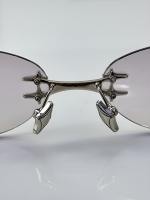 China Y2K Futuristic Star Rimless Sunglasses for Women | Retro Oval Cat‑Eye Frameless Sun Glasses, Ultra‑Light Titanium Temple Streetwear Party Shades, 4 Lens Color Options for sale