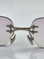 China Y2K Futuristic Four‑Pointed Star Rimless Sunglasses Unisex Double Thin Silver Metal Temple Cut‑Edge No‑Frame Square Lens Luxury Streetwear Party Shades for Men Women for sale