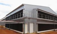 China Galvanized Steel Prefabricated Chicken Coop with Mesh Screened Windows for Easy and Quick Assembly for sale
