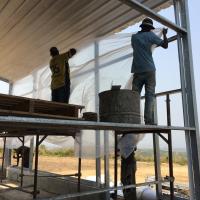 China Prefab Steel Poultry House with Fog Spray System and Sliding Steel Doors for Breeder Chicken Farms for sale