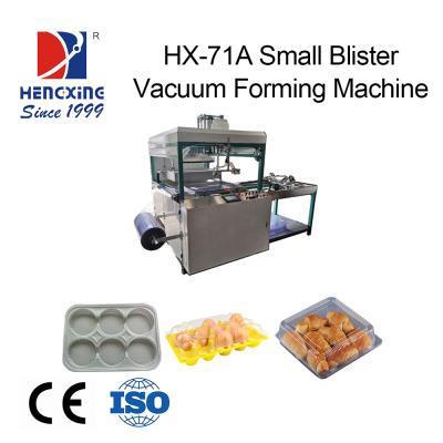China Small Automatic Vacuum Forming Plastic Thermoforming Packaging Machine For Plastic Food Tray Toy Packaging Hardware Plastic Packaging for sale