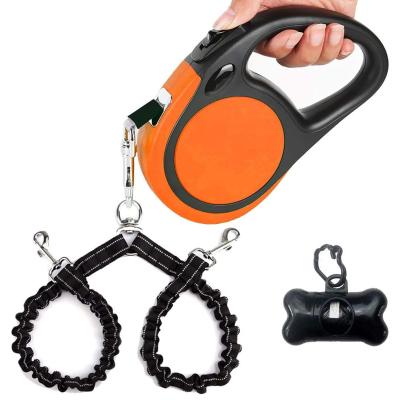 China Double Head Retractable Dog Leash 3m with Flashlight and Bag Dispenser for Large Dogs 50kg for sale