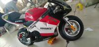 China Surron X Black Edition 49cc Kids Dirt Bike with 6 Inch Wheels and 1.8L Fuel Tank for sale
