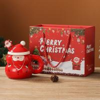 China Christmas Ceramic Mug 500ml Festive Gift Box Santa Snowman Design Custom Colors for sale