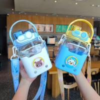 China Student Plastic Water Bottle with Handle and Shoulder Strap 980ml Cartoon Design for sale