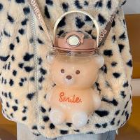 China 1L Bear-Shaped Plastic Water Bottle for Kids Portable Travel Drinking Bottle with Straw Custom Colors for sale