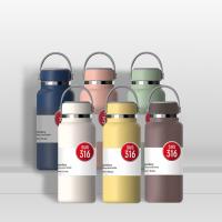 China 750ml Stainless Steel Vacuum Flask with Handle for Kids 304 Grade Insulated Water Bottle for sale