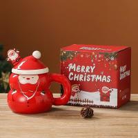 China Luxury Christmas Ceramic Santa Mug 400ml Custom Logo Design White Red Green for sale