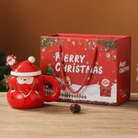 China Luxury Christmas Ceramic Santa Mug 400ml Custom Logo Design White Red Green for sale