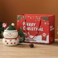China Luxury Christmas Ceramic Santa Mug 400ml Custom Logo Design White Red Green for sale